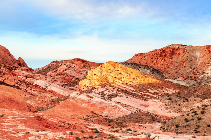 A Rocky Hillside with a Yellow Rock in the Middle Stock Photo - Image ...