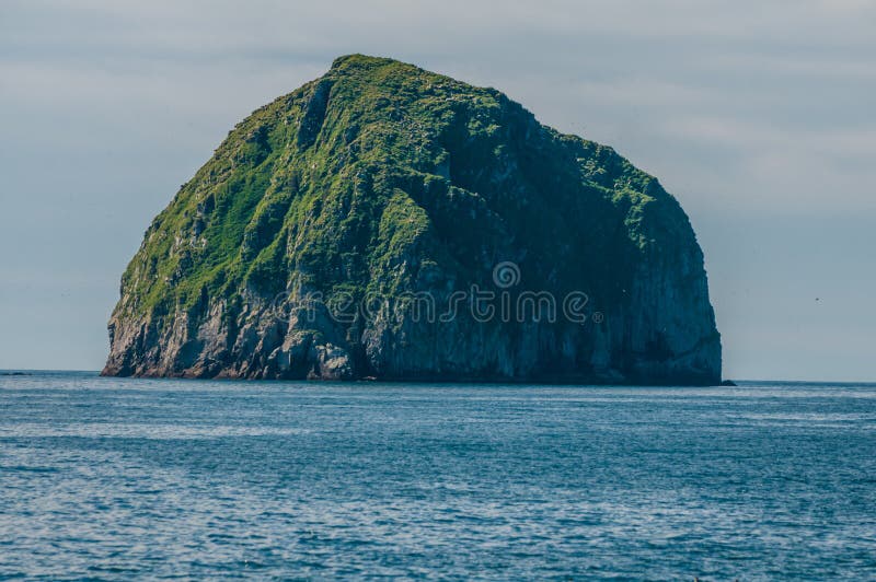 Rocky island stock image. Image of ocean, cliff, rock - 36395809