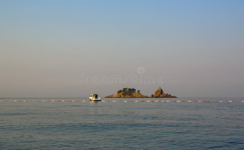A Lonely Boat Approached the Island Stock Image - Image of gwynedd ...