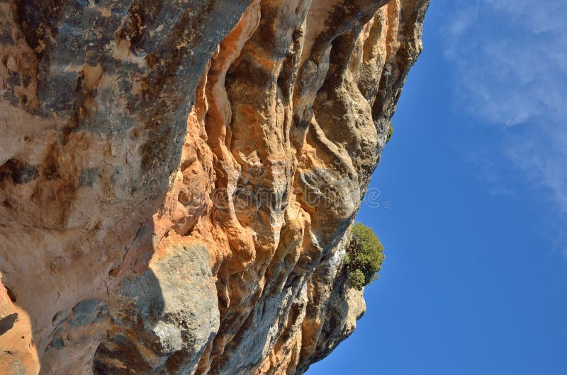 Rocky mountain cliff stock photo. Image of undercut, formation - 81502004