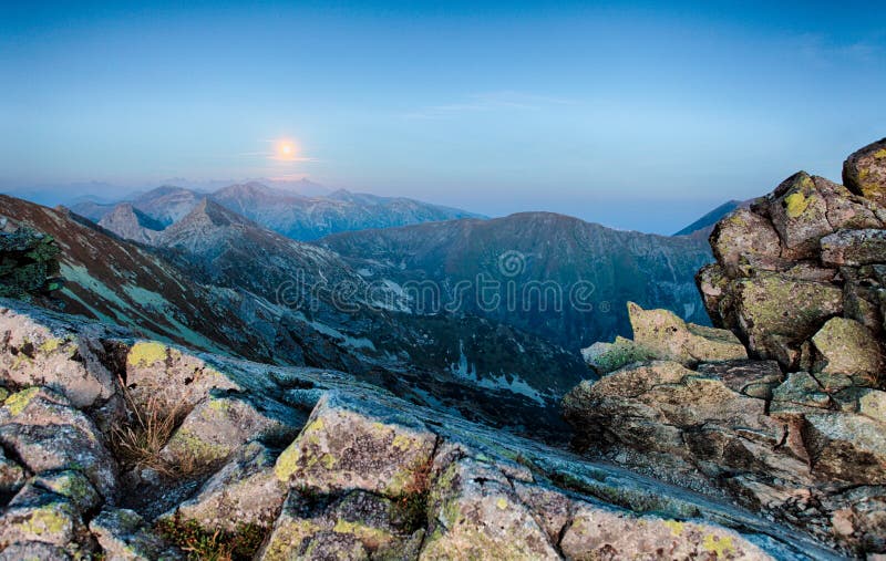 Rocky Mountain at night stock image. Image of hill, grass - 62341571