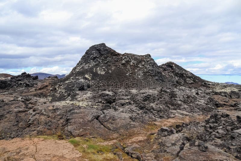 Rocky Mountain with a Patch of Grass on the Side Stock Image - Image of ...