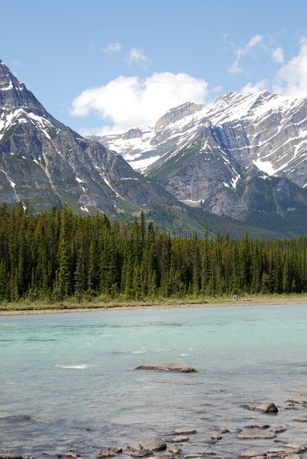 Rocky mountains and river stock photo. Image of national - 5528350