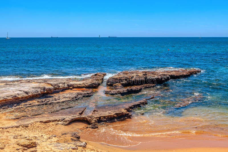 Rocky ocean shore stock image. Image of holiday, nature - 168885929