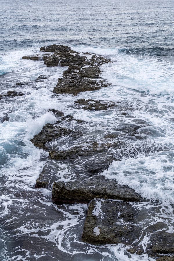Rocky Path in the Sea with Foamy Waves. Beautiful Landscape Stock Image ...