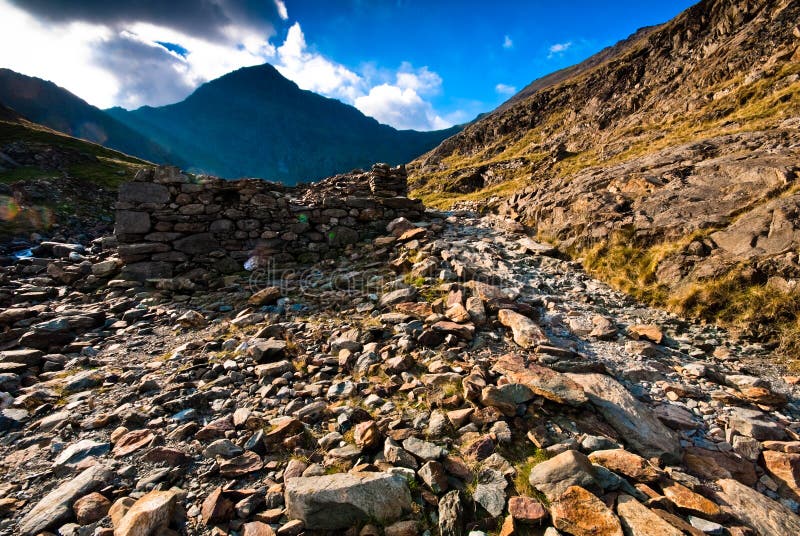 Rocky Road and a Beautiful Mountain Stock Photo - Image of grass, dirty ...