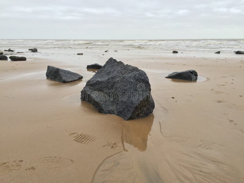 Rocky sand stock image. Image of holiday, rock, seaside - 84035111