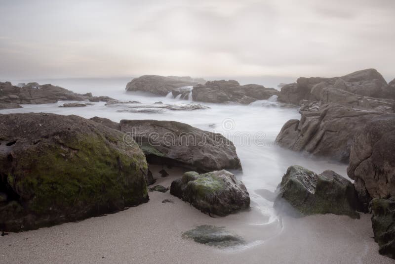 Rocky sea beach stock image. Image of island, tropical - 65307575