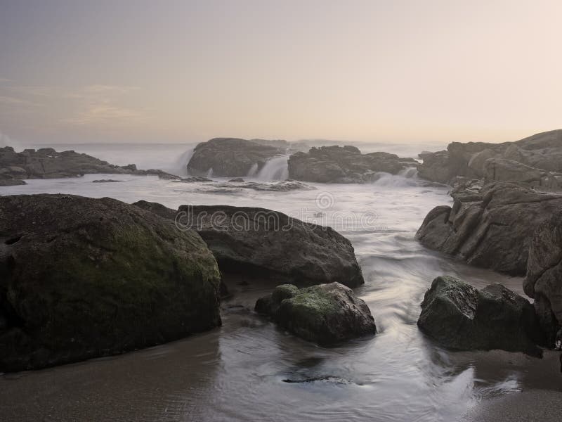 Rocky sea beach stock image. Image of island, tropical - 65307575