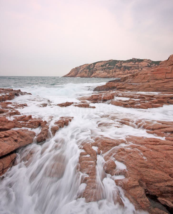 Rocky Sea Coast and Blurred Water in Shek O Stock Photo - Image of ...