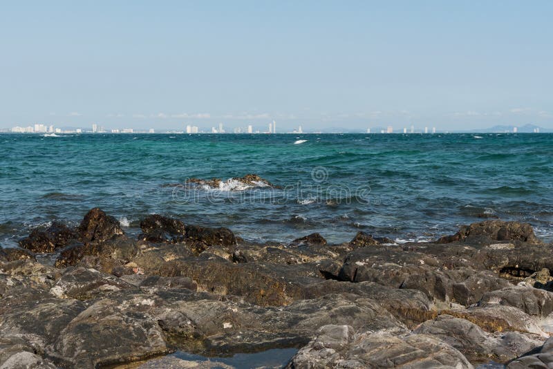 Rocky sea coast and beach stock photo. Image of shore - 70027902