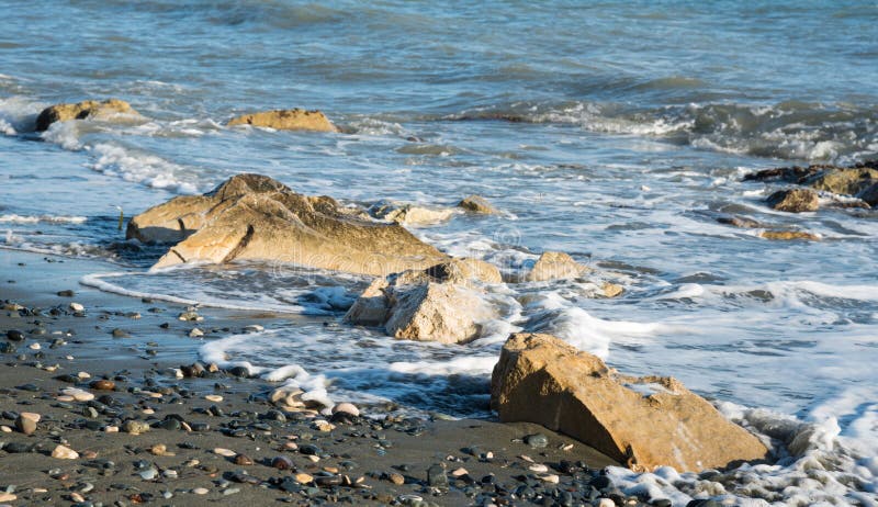Rocky Seashore and Black Sand Stock Image - Image of sand, scenery ...