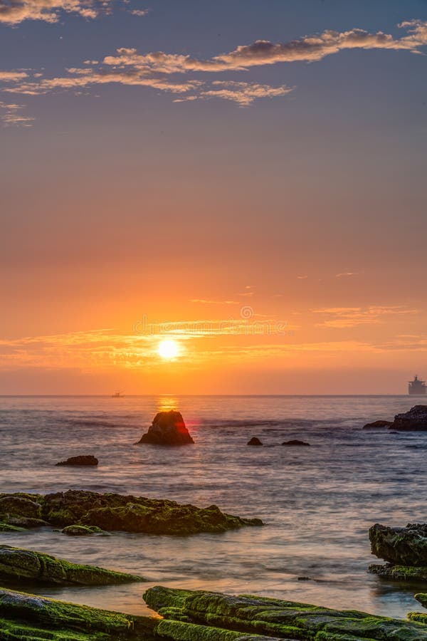 Rocky seashore sunrise stock image. Image of coastline - 58848813