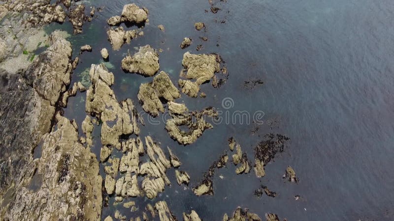 Rocky Seashore, Top View. Calm Water Surface, Small Ripples on the ...