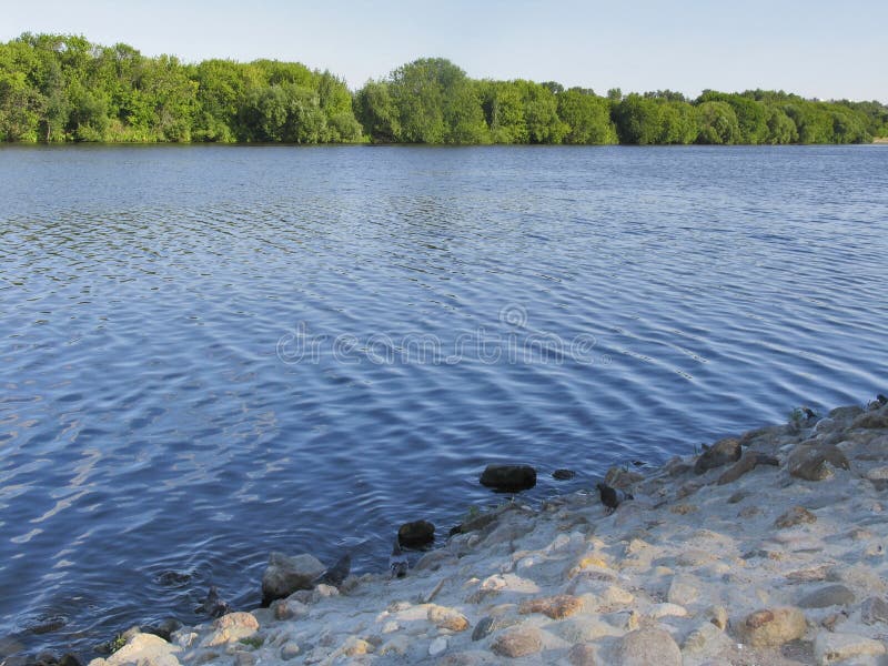 Rocky shore of the river stock photo. Image of seascape - 48226962