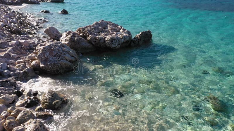Rocky Shore with Shallow Turquoise Sea. Stock Footage - Video of ...