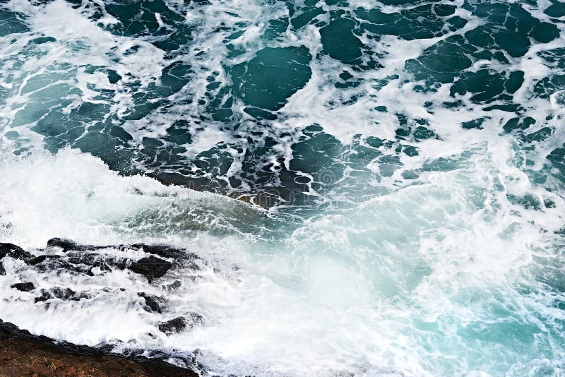 Rocky shore. Tidal bore stock image. Image of bore, splash - 222314137