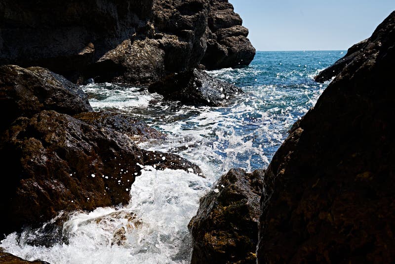 Rocky shore. Tidal bore stock photo. Image of ocean - 225865440