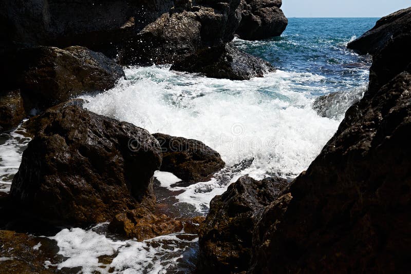 Rocky shore. Tidal bore stock photo. Image of scenic - 253069772