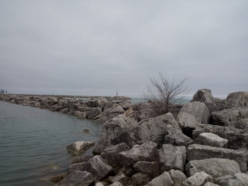 Rocky Shoreline on the Water Stock Image - Image of wall, beach: 182837829