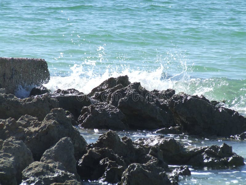 Rocky water stock photo. Image of wave, promontory, florida - 98222212
