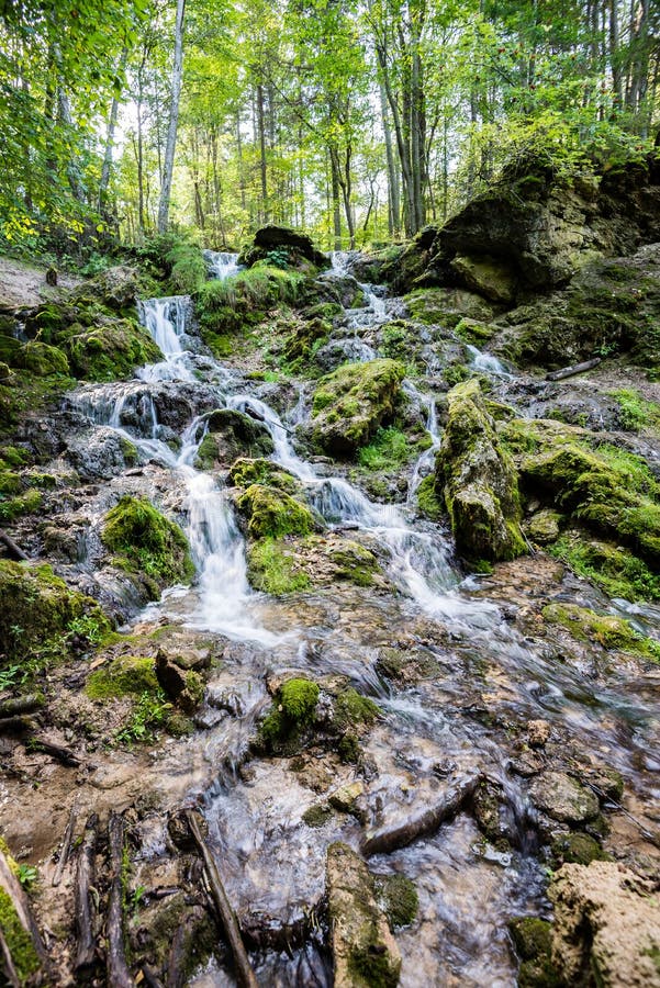 Rocky waterfall in summer stock image. Image of cold - 80782945