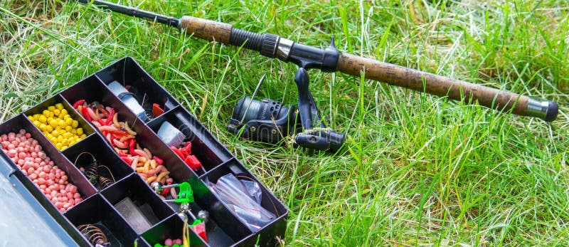 Rod and Tackle on the Grass. Nature Stock Image - Image of spool ...