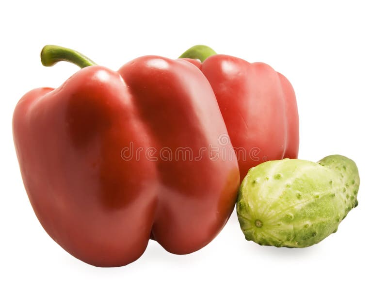 Rode paprika en komkommer stock foto. Image of kleur - 12986780