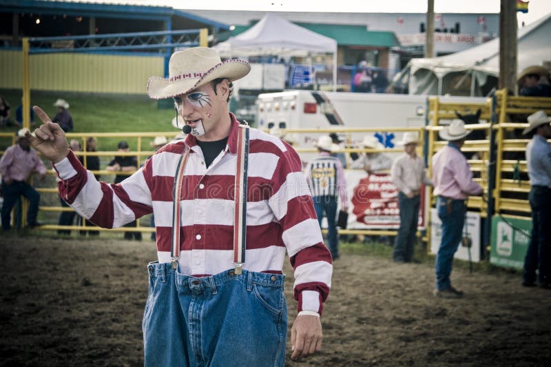 Rodeo clown and cowboys editorial stock image. Image of alberta - 28945969