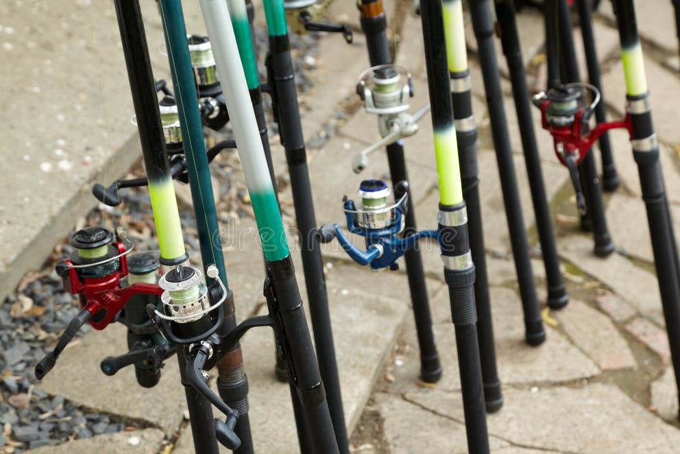 Rods with Reels Covered Stand on Ground Stock Photo - Image of bait ...