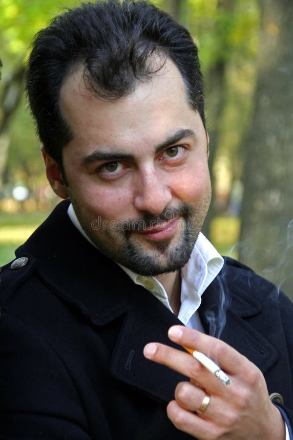 Rokende mens stock foto. Image of verbranding, verslaving - 8628748