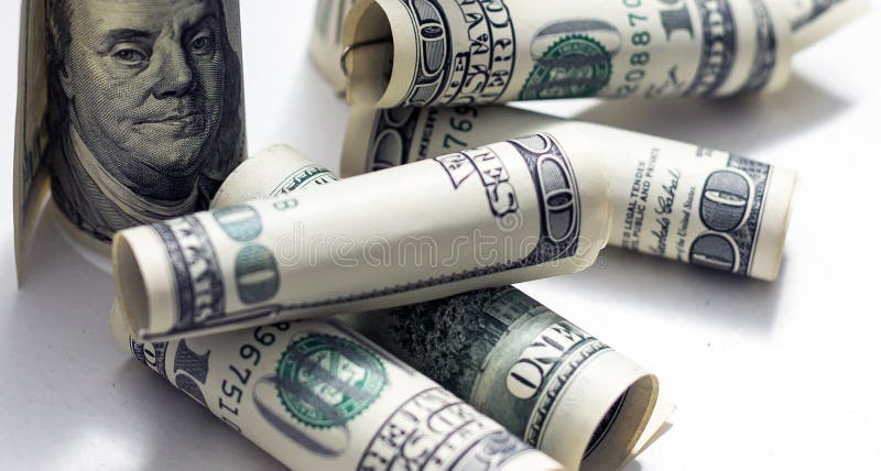 Roles Dollar Notes in Front of White Background Stock Image - Image of ...