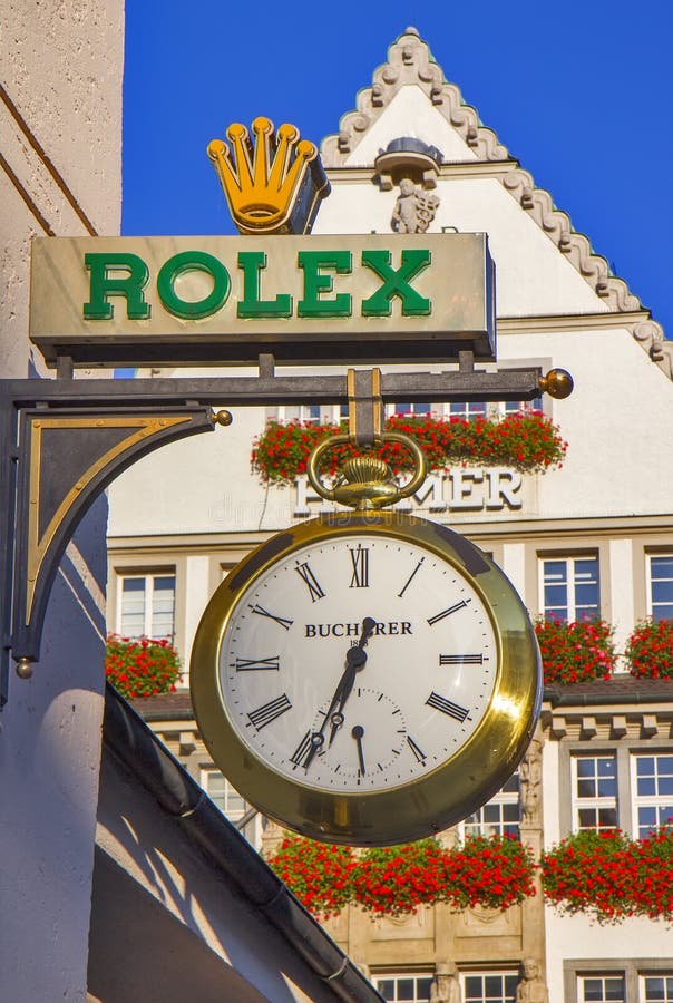 Rolex Sign and Watch in Munich Editorial Photography - Image of closeup ...