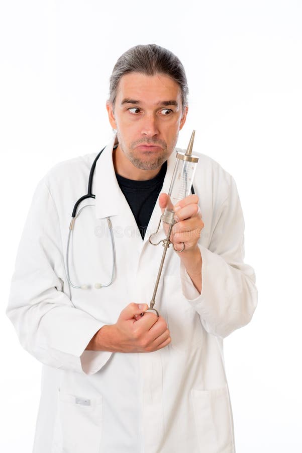 Rolig Doktor Med En Stor Injektion Fotografering för Bildbyråer - Bild ...