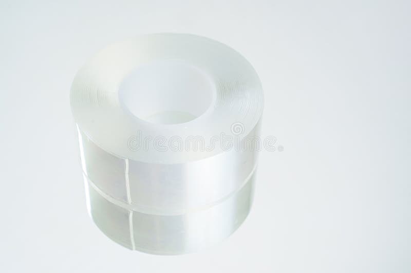 A Roll of Adhesive Transparent Tape on a White Background. Stock Photo ...