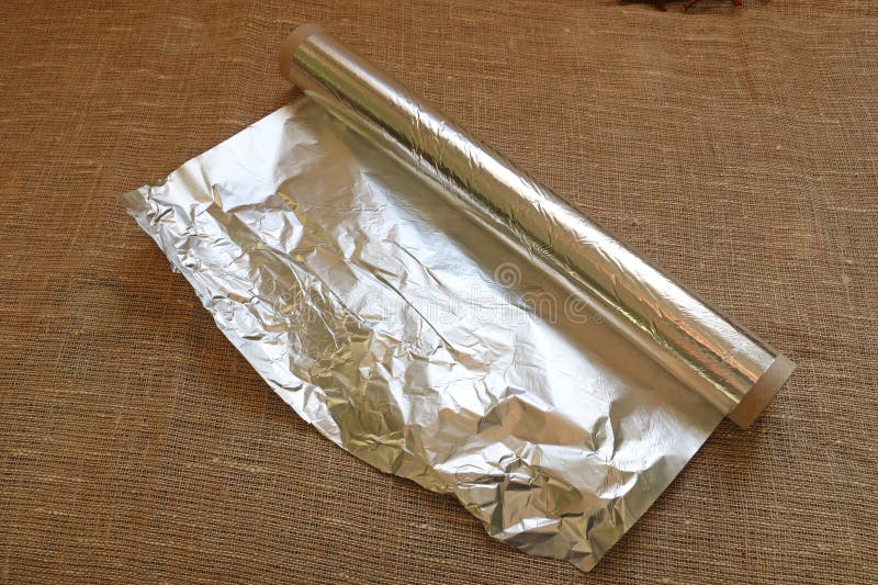 Roll of Aluminium Foil for Cooking Stock Photo - Image of clothing ...