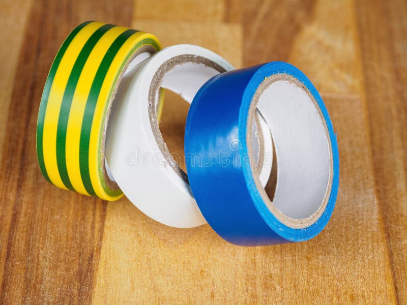 A Roll of Black Insulating Tape, Its Texture and Shine. a Close-up of a ...