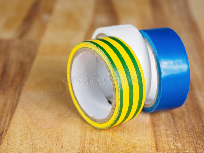 A Roll of Black Insulating Tape, Its Texture and Shine. a Close-up of a ...