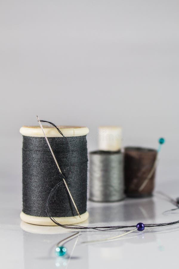 Roll of black thread stock photo. Image of closeup, metallic - 48686928