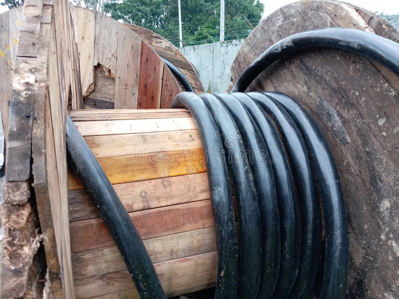 Roll of Black Underground Electric Cables in the Working Site on the ...