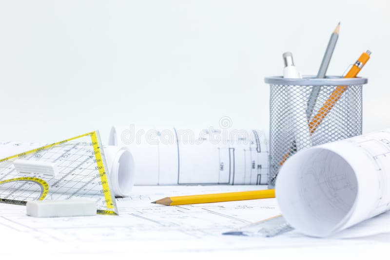 Roll Blueprints with Engineering Drawing Tools on Architect Work Stock ...