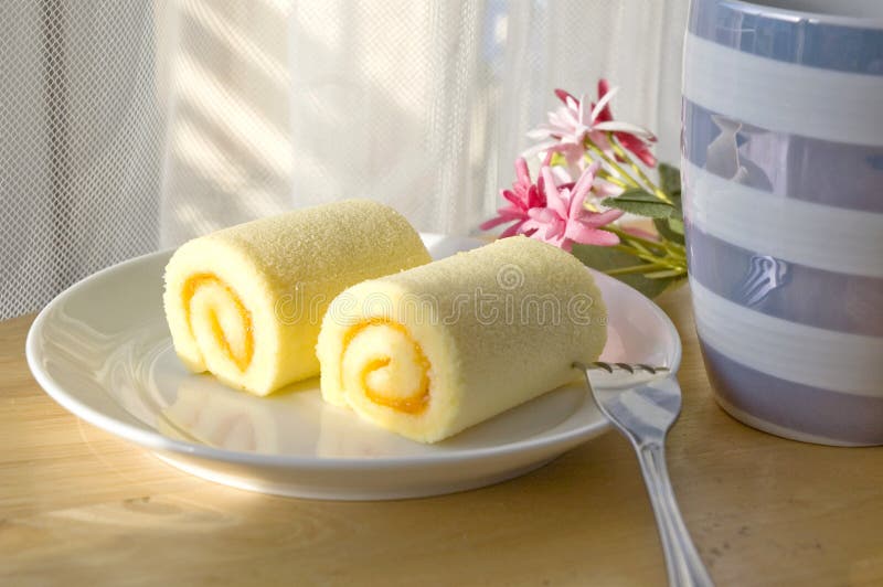 Roll cake on plate stock image. Image of flavor, coffee - 24634865