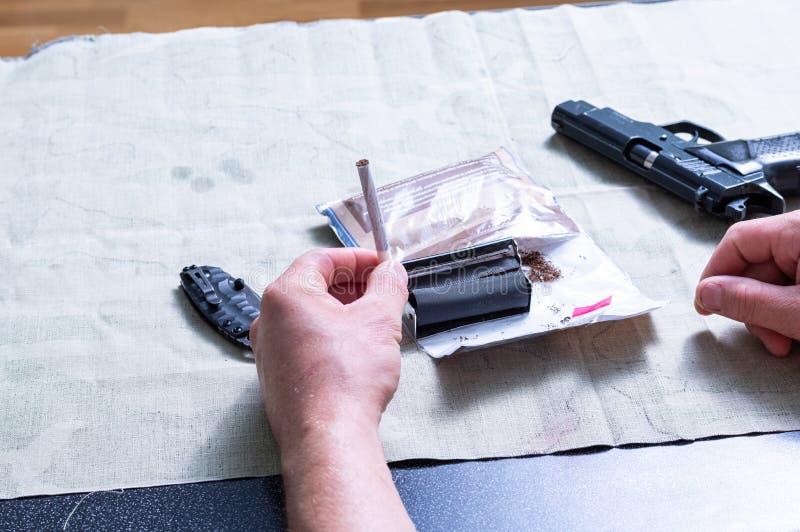 Roll a Cigarette on a Hand-held Machine. Make a Cigarette Stock Image ...