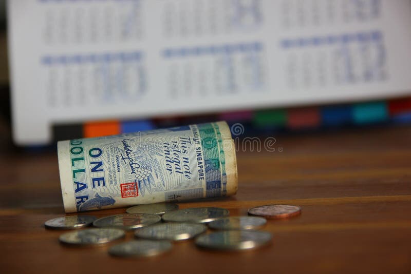 Roll Dollar Singapore with Coins on Table Stock Image - Image of ...
