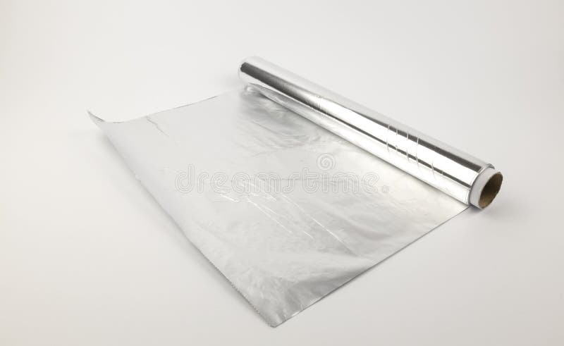 A Roll of Foil for Baking. Aluminum Foil. Home Baking Concept. Stock ...