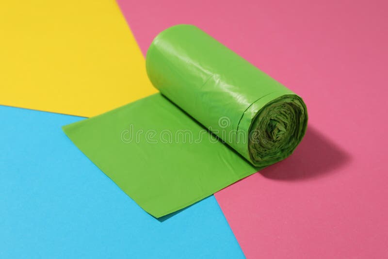 Roll of Green Garbage Bags on Color Background Stock Image - Image of ...