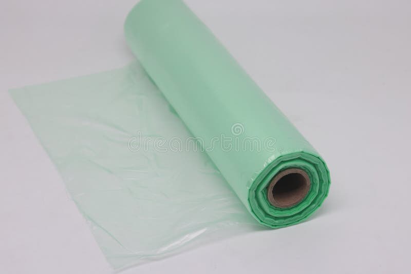 Roll of Green Garbage Bags Isolated on White. Stock Image - Image of ...