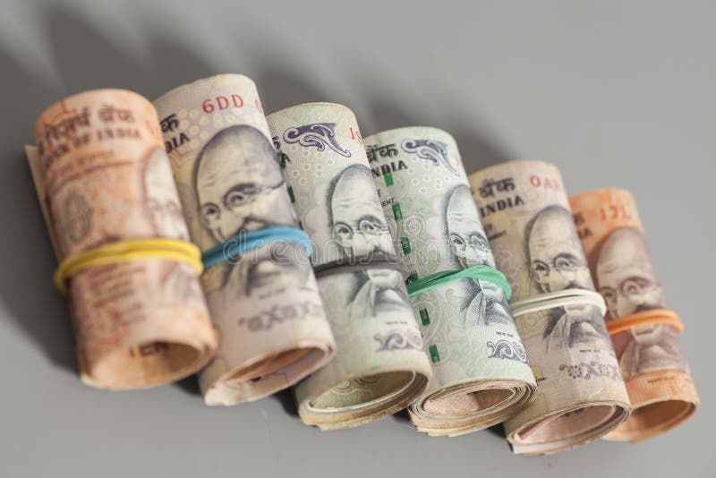 Roll of Indian Currency Rupees Notes and Coins Stock Photo - Image of ...
