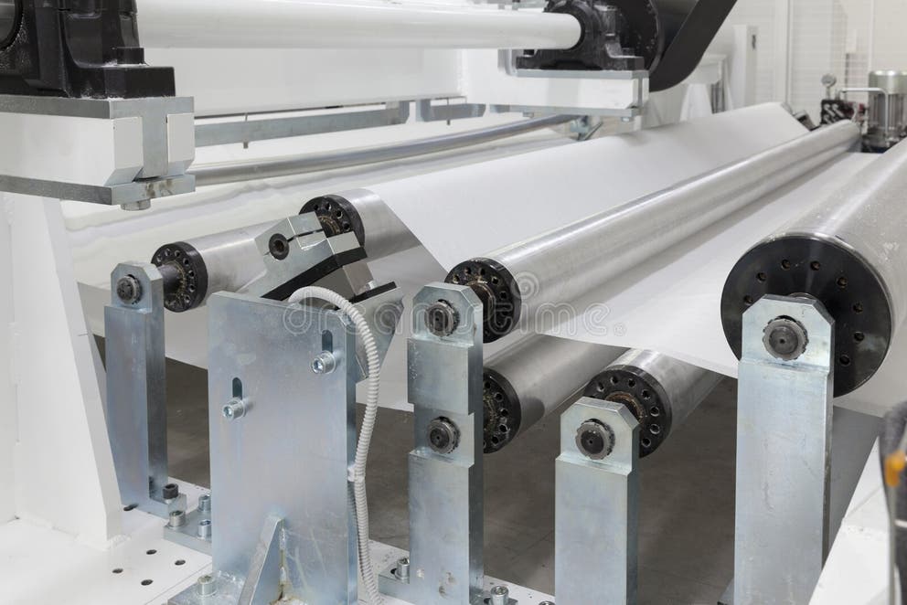 Roll machine for paper stock image. Image of process - 79903757