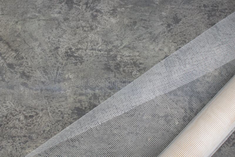 Roll Mesh for Plastering on the Gray Concrete Background. Copy Space ...